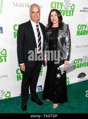 L-R: Sandra Ripert and Eric Ripert attend the NY premiere of We Feed ...