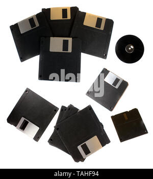 Old floppys used for computer storage in 80s and 90s, on white studio ...