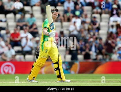 Australia's Steve Smith raises his bat as he celebrates after scoring ...