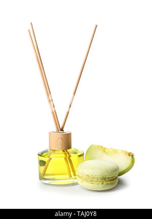 Apple reed diffuser on white background Stock Photo - Alamy