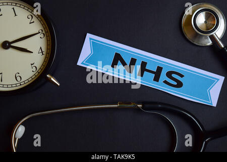 NHS with stethoscope concept inspiration on yellow background Stock ...