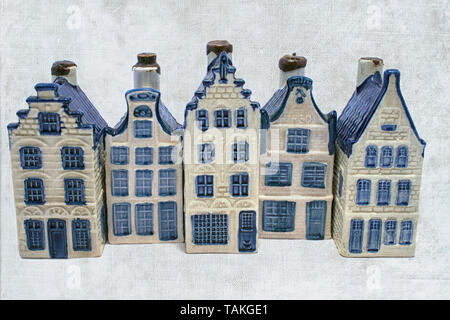 Delft blue (aka dutch china) ceramic houses isolated on white. Part of ...