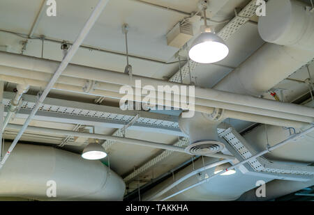 Air duct, wiring and plumbing in the mall. Air conditioner pipe, wiring ...