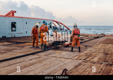 Vessel crew preparing vessel for static tow tanker lifting Stock Photo ...
