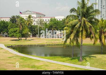 Golf course field with pond near Intramuros, Manila, Philippines Stock ...