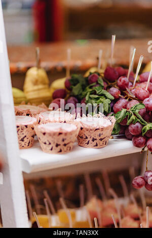 sweet festive buffet, fruit, caps, macaroni and lots of sweets well ...