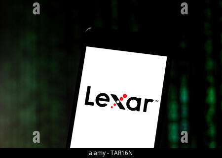 In this photo illustration the Lexar logo is seen displayed on a ...
