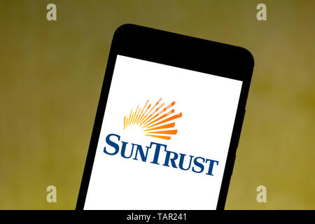 In this photo illustration the SunTrust Banks logo is seen displayed on ...