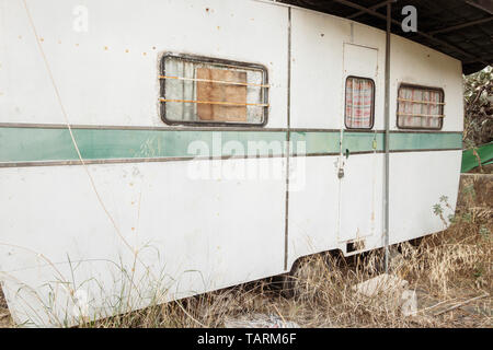 Old, abandoned caravan in a field in Somerset, England Stock Photo - Alamy