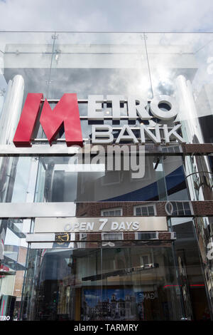 Metro bank branch premises & sign logo in town centre retail park ...