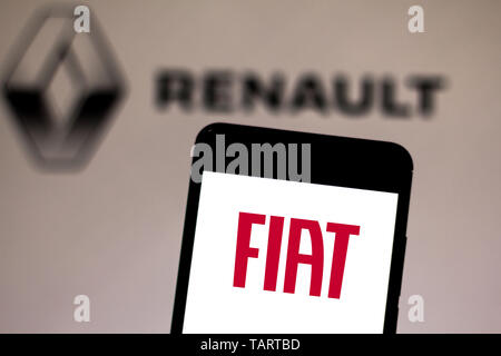 In this photo illustration the FIAT (Fabbrica Italiana Automobili ...