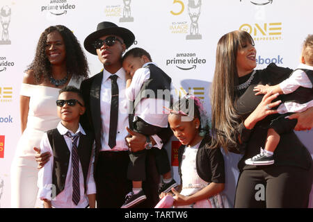 LOS ANGELES - MAR 30: Ne-Yo, family at the 50th NAACP Image Awards ...