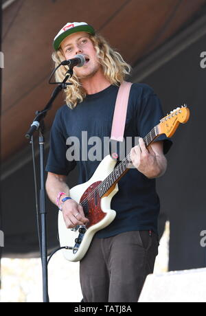 Singer, songwriter and guitarist Ben Reed is shown performing on stage ...