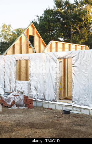 Timber frame house extension or annexe under construction in the UK ...