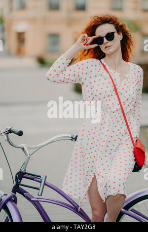 Photo of dreamy thoughtful young lady wear knitted pullover headwear ...