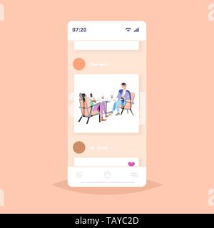 businesspeople couple sitting at cafe table and drinking coffee during ...