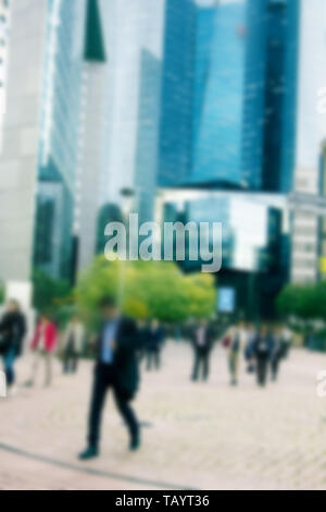 People are strong blurred anonymous. Business quarter with bulk of ...