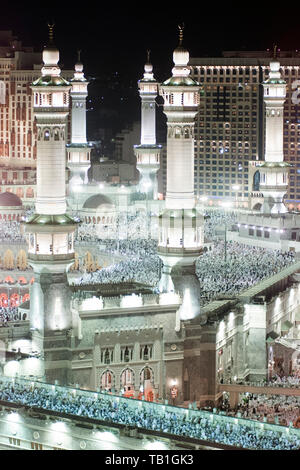 Thousands of Muslims gather around the holy Kaaba, cube at centre, of ...