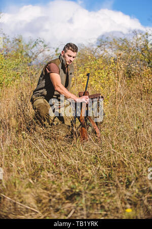 Recharge rifle concept. Man with rifle hunting equipment nature ...