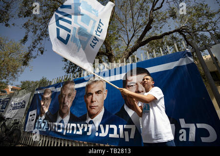 Israeli Prime Minster Yair Lapid and his wife Lihi arrive to vote ...