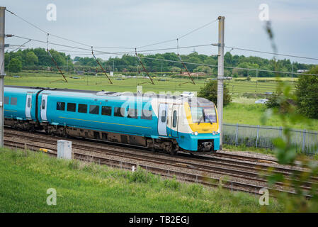Class 175 Arriva DMU train at Winwick with D1944 diesel locomotive ...