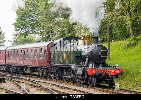 A steam train leaving Shackerstone Station on the Battlefield Line ...