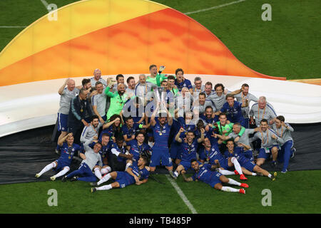 Arsenal players celebrate following the UEFA Champions League match at ...