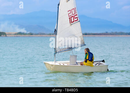 Young Children learning to sail the ocean Stock Photo - Alamy