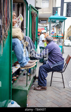 Shoeshine booth in the streets of the Historic Center of Lima, Peru ...