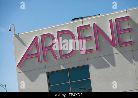 A logo sign outside of the headquarters of Ardene in Saint-Laurent ...