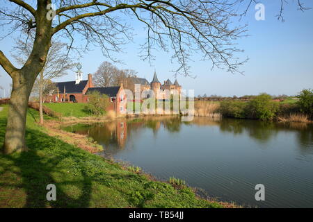 Netherlands, Muiden, Castle Muiderslot and IJmeer lake. Background ...