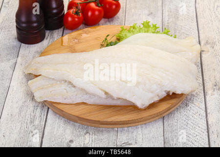 Raw halibut fillet ready for cooking Stock Photo - Alamy