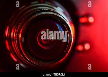 Camera lens and red backlight . Horizontal photography. Banner Stock ...