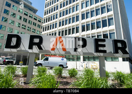 A logo sign outside of the headquarters of the Draper Laboratory in ...