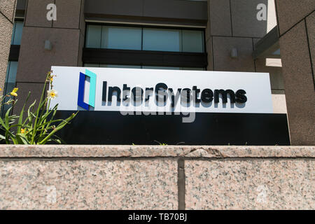 A logo sign outside of the headquarters of InterSystems Corporation in ...