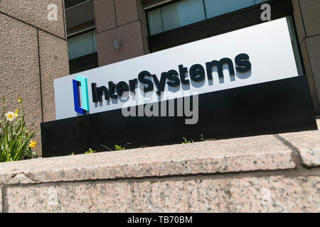 A logo sign outside of the headquarters of InterSystems Corporation in ...