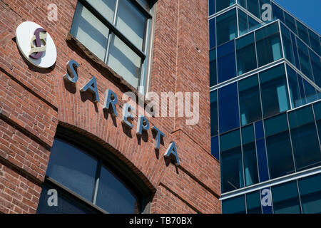 A logo sign outside of the headquarters of Sarepta Therapeutics, Inc ...