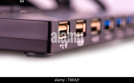 Detail of many USB ports on a computer port multiplier hub on white ...