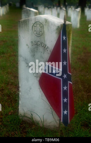 A Confederate flag on a grave, at the Confederate Cemetery in ...
