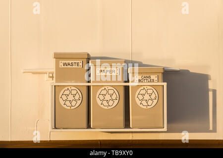 Recycling bins on the deck of a ship Stock Photo - Alamy
