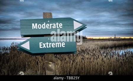 Street Sign the Direction Way to Moderate versus Extreme Stock Photo ...