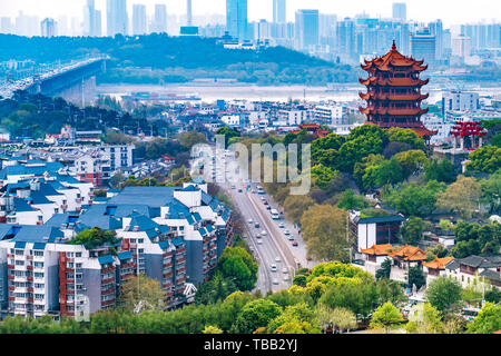 yellow tower crane in a construction site Stock Photo - Alamy