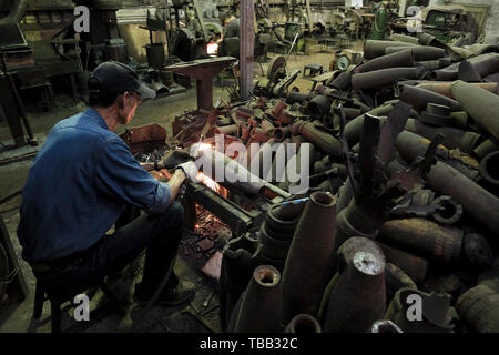 Taiwanese blacksmith Wu Tseng-tong known as Maestro Wu crafts a knife ...