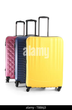 Packed suitcases on white background Stock Photo - Alamy