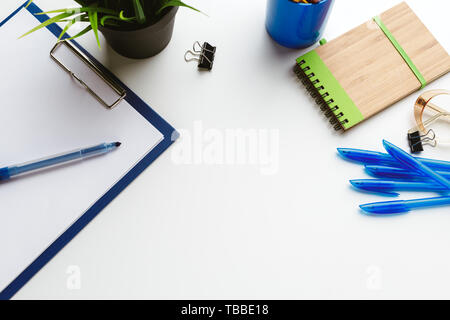 Business Items dropped in creative Disorder on white Table Stock Photo ...