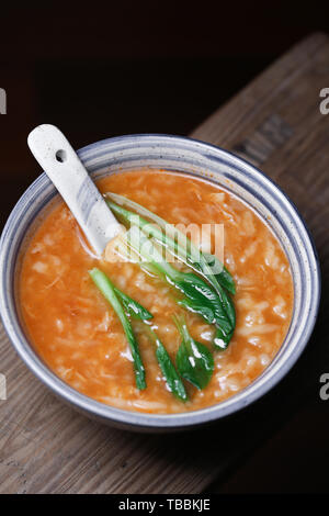 Traditional Chinese snack tomato lumpy soup Stock Photo - Alamy