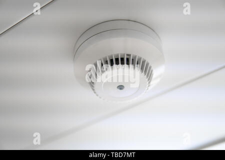 fire detector at ceiling, smoke and flame alarm sensor in commercial ...