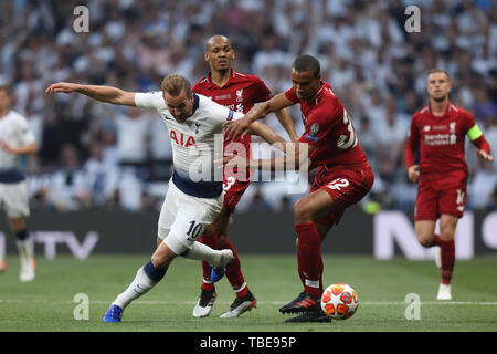 Joel Matip of Liverpool FC competes for the ball with Alessandro Zanoli ...