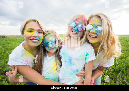 Friendship, holidays, color concept - friends smiling and having fun in ...
