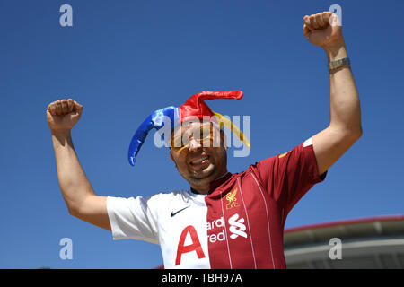 A fan with a half and half shirt before the UEFA Champions League Final ...